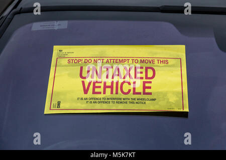 Black Untaxed Car with window sticker Stock Photo - Alamy
