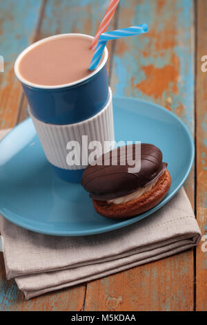 Bouchee cake with chocolate Stock Photo - Alamy