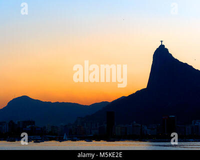 Beautiful orange sunset with mountains and Christ the Redeemer Stock ...