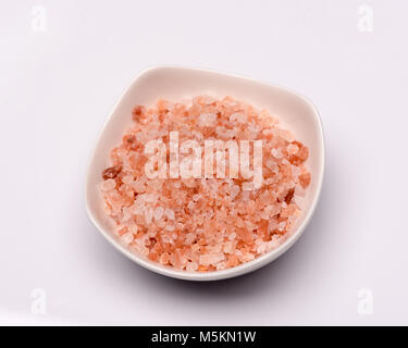 Himalayan pink salt. Kitchen salt and chili peppers. Spices on grill ...