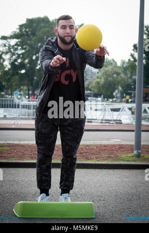 Playing curb ball. Dutch Championship Stock Photo - Alamy