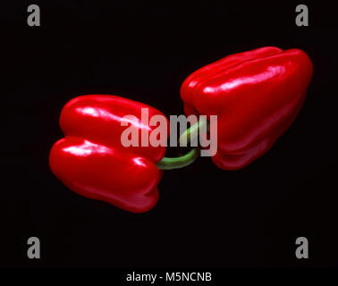 Green organic Bell Peppers against a white background Stock Photo - Alamy