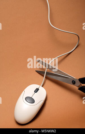 Computer mouse with black cable and scissors. Cut out or wireless ...