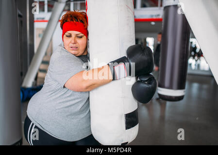 Overweight Woman Boxing in Gym Stock Photo - Alamy