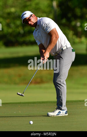 Ryan Fox, of New Zealand, putts on the 14th hole during the first round ...