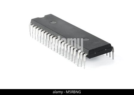 Computer chip DIP 40 pin isolated on white background. Four pieces in a ...