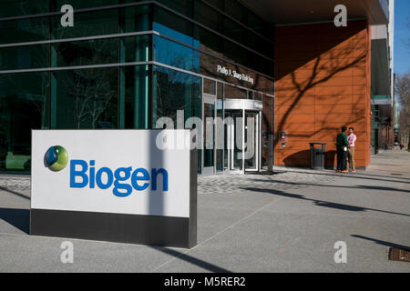 A logo sign outside of the headquarters of Biogen, Inc., in Cambridge ...