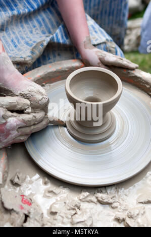 Pottery - formation process of the clay dish with traditional method as ...