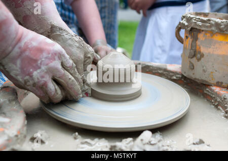 Pottery - formation process of the clay dish with traditional method as ...