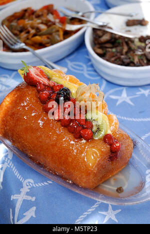 Pastry, Traditional Italian rum cake with whipped cream and raspberries ...