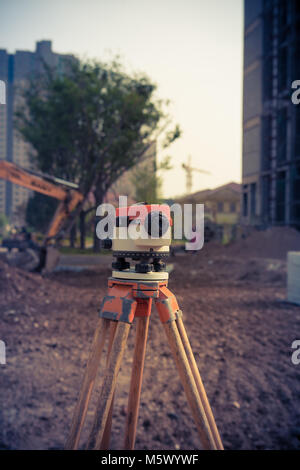 Laser rangefinder at a construction site. Measuring tool at a ...