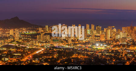 Tantalus Lookout at night, Puu Ualakaa State Park Honolulu. Tourists on ...