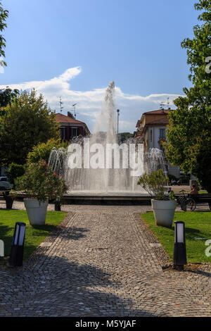 town fountain, front view with meadow Stock Photo - Alamy