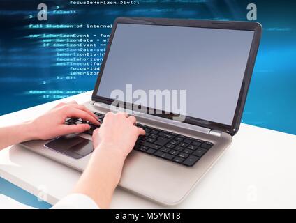Hands typing coding text Stock Photo - Alamy