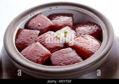 Dongpo's braised pork in brown sauce on white rice, served on table at ...