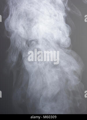 WATER Evaporation Steam rising from water boiling in a clear ...