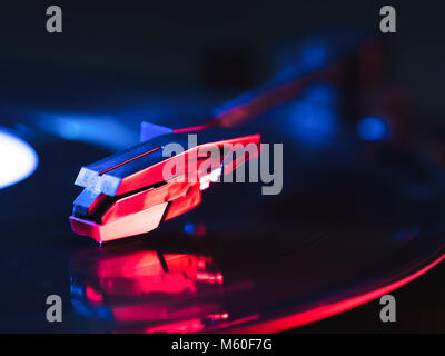 Cinemagraph, retro record vinyl player. Record on turntable. Top view ...
