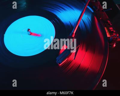 Cinemagraph, retro record vinyl player. Record on turntable. Top view ...