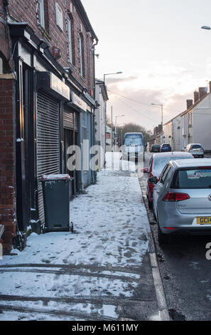 A sprinkling or dusting of snow in Telford, covering roofs and pathways ...