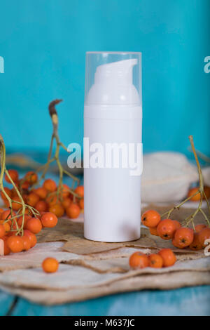 Face cream with rowan berries extract. Closeup Stock Photo - Alamy