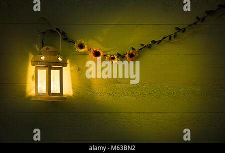 Old lamp lighting board with flowers Stock Photo - Alamy