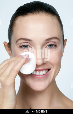 Skin care beauty woman showing empty palm with copy space for product ...