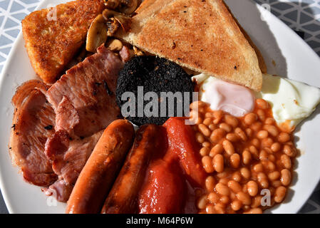 Full English Breakfast comprising of bacon, sausages, baked beans, hash ...