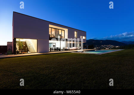 Modern villa with pool, night scene Stock Photo - Alamy