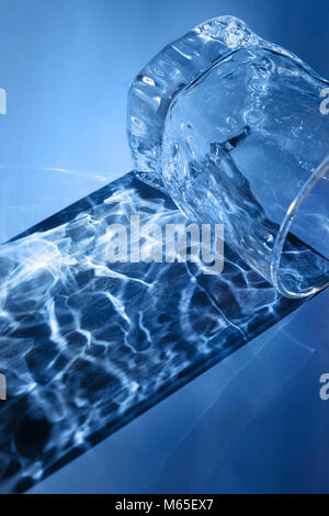 refraction of light through a glass of water Stock Photo - Alamy