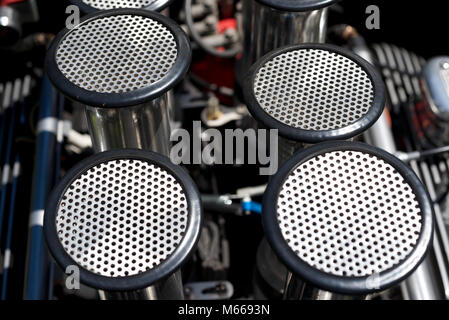 Trumpet air intakes installed on a Hot Rod engine Stock Photo - Alamy