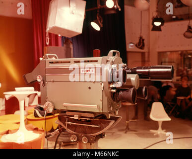 1960s CLOSE-UP OF TV CAMERA LENSES WITH STUDIO SET IN BACKGROUND Stock ...