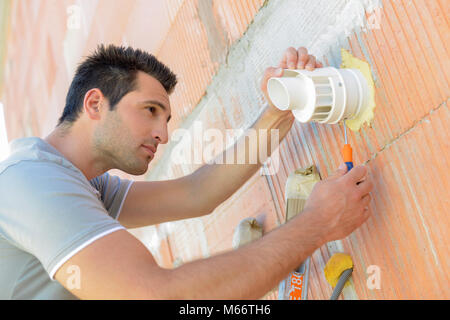 Repairing ventilation hatch Stock Photo - Alamy