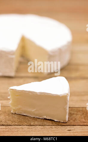 Beautiful White Round of Soft Cheese on a Wooden Table Stock Photo - Alamy