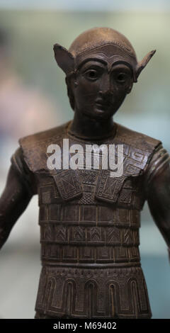 Etruscan, bronze votive statuette of a warrior with a shield, wearing ...