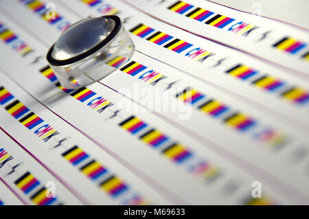 Printing loupe on proof CMYK color chart Stock Photo - Alamy