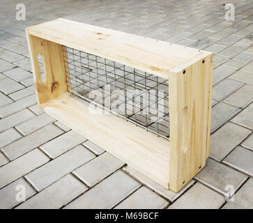 Sieve with a wooden frame for garden works Stock Photo - Alamy