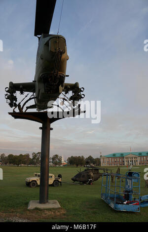 The Fort Stewart main gate static display AH-1 Cobra comes in for one ...