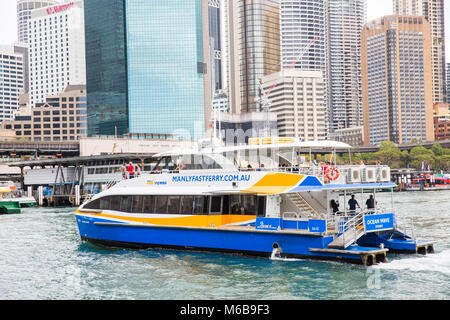 The Manly Fast Ferry approaching the Circular Quay Ferry Wharf with the ...