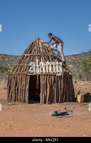 Indigenous African Wooden Hut of Himba with Chicken Stock Photo - Alamy