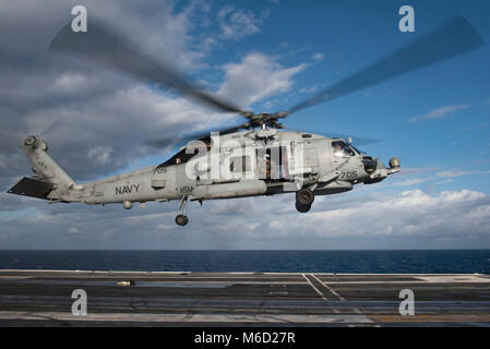 180227-N-NQ487-055 ATLANTIC OCEAN (Feb. 27, 2018) An MH-60R Seahawk ...