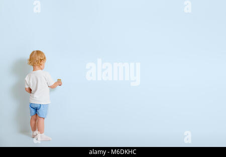 Little Kid Drawing Back View Stock Photo - Alamy