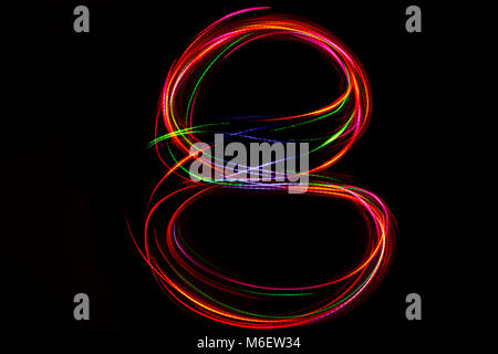 Blurred word writing from light on the black background Stock Photo - Alamy