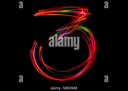 Blurred word writing from light on the black background Stock Photo - Alamy