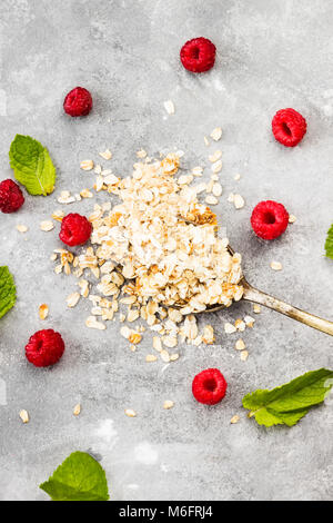 Glanola with raspberry and mint. Top view. Food background Stock Photo ...