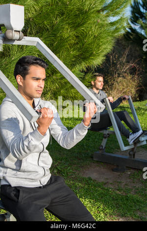 young man making exercise, working on work bench Stock Photo - Alamy