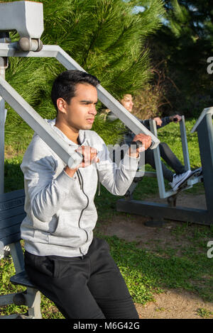 young man making exercise, working on work bench Stock Photo - Alamy