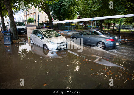 Road Flooded dur to high tide, River Thames at Putney, uk Stock Photo ...