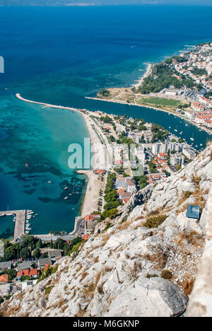 Aerial view of the shallow sea. View of Omis beach from the fortress on ...