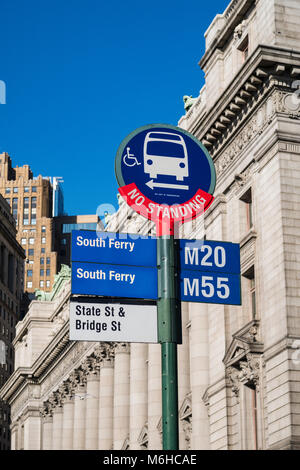 No Standing and bus stop signs on a street in New York Stock Photo - Alamy