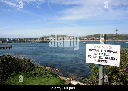 Warning sign near National Coastwatch lookout tower at Peveril Point on ...